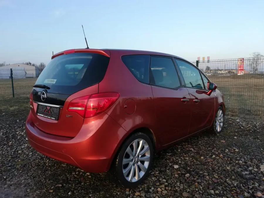 Orange Opel Meriva 2012 in Saldus, with an engine capacity of 1.70 L and mileage of 250 thousand km for 4990 €, photo 15 on AUTOMOTO.COM.LV