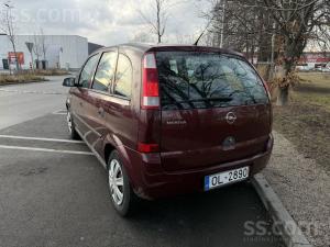 Красный Опель Мерива 2005 в Рига, объемом двигателя 1.60 л и пробегом 103 тыс. км за 1950 €, фото 4 на AUTOMOTO.COM.LV