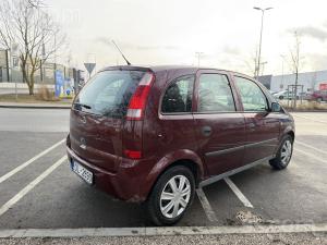 Red Opel Meriva 2005 in Riga, with an engine capacity of 1.60 L and mileage of 103 thousand km for 1600 €, photo 4 on AUTOMOTO.COM.LV