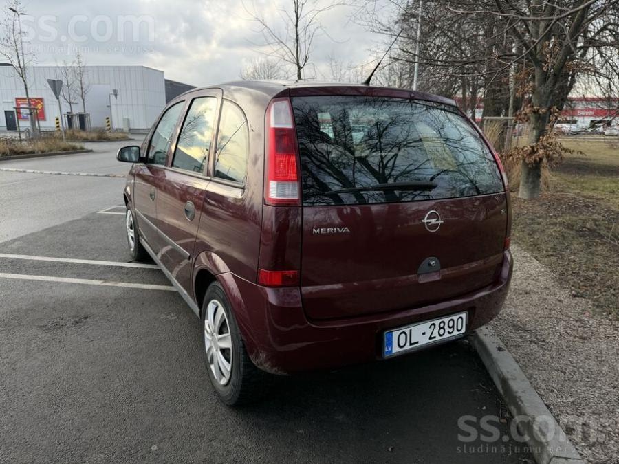 Red Opel Meriva 2005 in Riga, with an engine capacity of 1.60 L and mileage of 103 thousand km for 1600 €, photo 5 on AUTOMOTO.COM.LV
