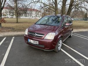 Red Opel Meriva 2005 in Riga, with an engine capacity of 1.60 L and mileage of 103 thousand km for 1600 €, photo 7 on AUTOMOTO.COM.LV