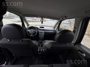 Red Opel Meriva 2005 in Riga, with an engine capacity of 1.60 L and mileage of 103 thousand km for 1600 €, photo 12 on AUTOMOTO.COM.LV
