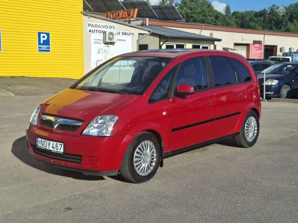Red Opel Meriva 2005 in Plunge, with an engine capacity of 1.36 L and mileage of 125 thousand km for 850 €, photo 1 on AUTOMOTO.COM.LV