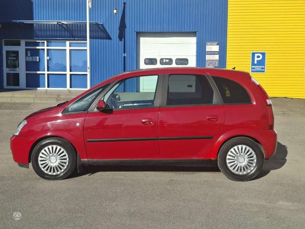 Red Opel Meriva 2005 in Plunge, with an engine capacity of 1.36 L and mileage of 125 thousand km for 850 €, photo 2 on AUTOMOTO.COM.LV