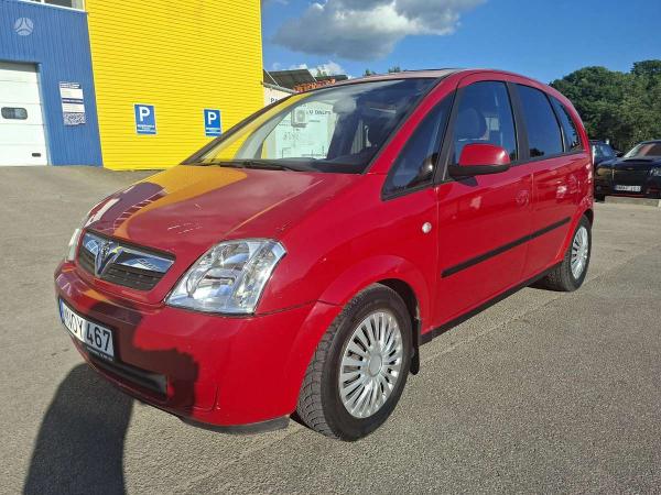 Red Opel Meriva 2005 in Plunge, with an engine capacity of 1.36 L and mileage of 125 thousand km for 850 €, photo 9 on AUTOMOTO.COM.LV