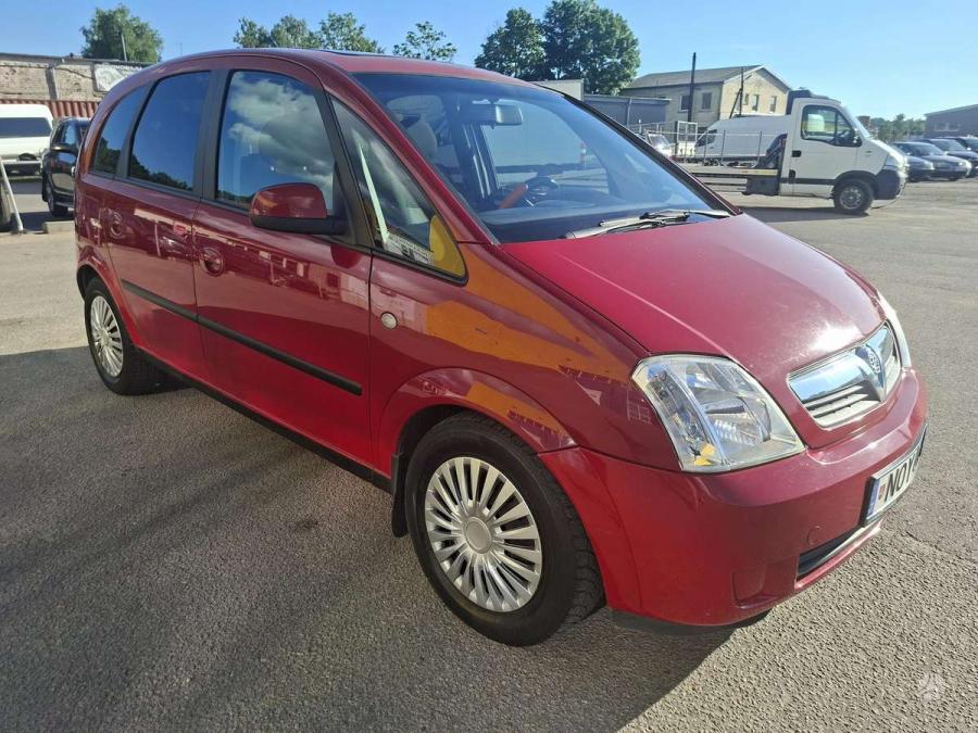 Sarkans Opel Meriva 2005 Plungė, ar dzinēja tilpumu 1.36 L un nobraukumu 125 tūkst. km par 850 €, foto 14 vietnē AUTOMOTO.COM.LV