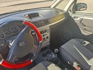 Sarkans Opel Meriva 2005 Plungė, ar dzinēja tilpumu 1.36 L un nobraukumu 125 tūkst. km par 850 €, foto 18 vietnē AUTOMOTO.COM.LV