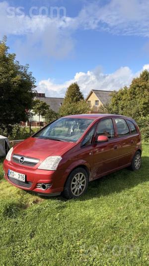 Sarkans Opel Meriva 2006 Krāslava, ar dzinēja tilpumu 1.70 L un nobraukumu 240 tūkst. km par 600 €, foto  vietnē AUTOMOTO.COM.LV