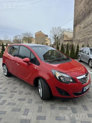 Sarkans Opel Meriva 2012 Rīga, ar dzinēja tilpumu 1.70 L un nobraukumu 232 tūkst. km par 3800 €, foto  vietnē AUTOMOTO.COM.LV