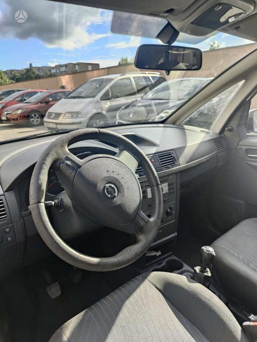 White Opel Meriva 2006 in Vilnius, with an engine capacity of 1.60 L and mileage of 242 thousand km for 1150 €, photo 7 on AUTOMOTO.COM.LV