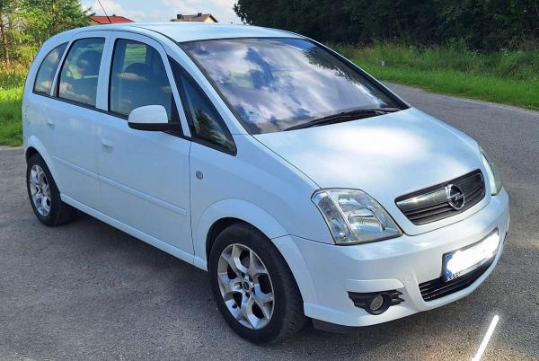 Balts Opel Meriva 2009 Panevēža, ar dzinēja tilpumu 1.69 L un nobraukumu 250 tūkst. km par 1400 €, foto 3 vietnē AUTOMOTO.COM.LV