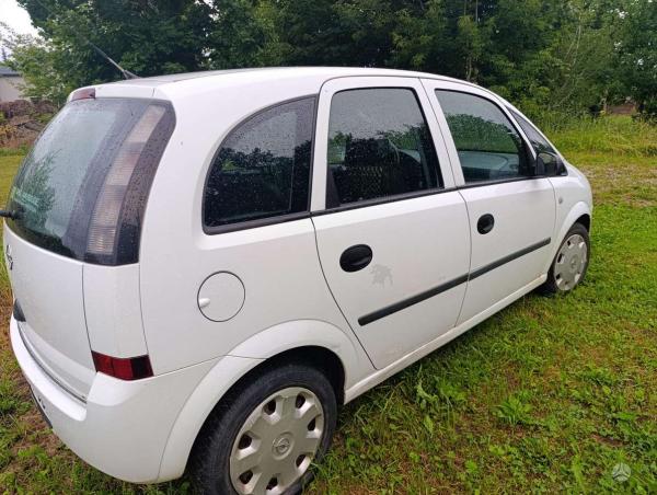 White Opel Meriva 2010 in Kaunas, with an engine capacity of 1.36 L and mileage of 229 thousand km for 900 €, photo 2 on AUTOMOTO.COM.LV