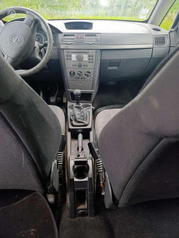 White Opel Meriva 2010 in Kaunas, with an engine capacity of 1.36 L and mileage of 229 thousand km for 900 €, photo 7 on AUTOMOTO.COM.LV
