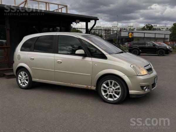 Yellow Opel Meriva 2006 in Riga, with an engine capacity of 1.70 L and mileage of 367 thousand km for 900 €, photo 6 on AUTOMOTO.COM.LV