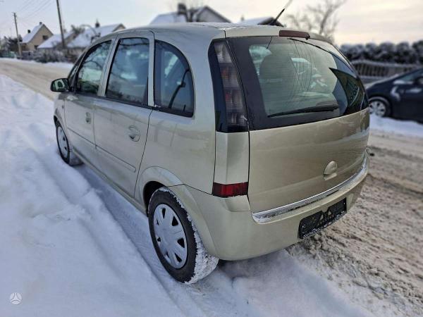 Yellow Opel Meriva 2008 in Marijampole, with an engine capacity of 1.40 L and mileage of 210 thousand km for 1350 €, photo 4 on AUTOMOTO.COM.LV