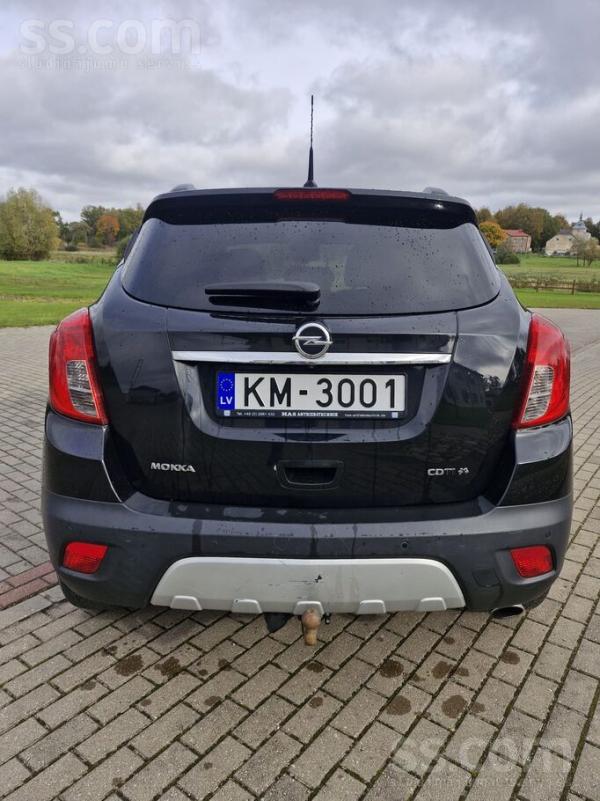 Black Opel Mokka 2012 in Valmiera, with an engine capacity of 1.70 L and mileage of 197 thousand km for 6600 €, photo 6 on AUTOMOTO.COM.LV