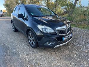 Black Opel Mokka 2013 in Taurage, with an engine capacity of 1.69 L and mileage of 181 thousand km for 6200 €, photo  on AUTOMOTO.COM.LV