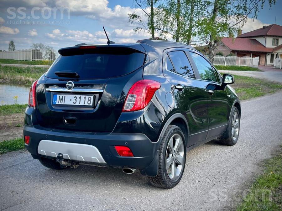 Black Opel Mokka 2013 in Riga, with an engine capacity of 1.70 L and mileage of 279 thousand km for 6500 €, photo 4 on AUTOMOTO.COM.LV