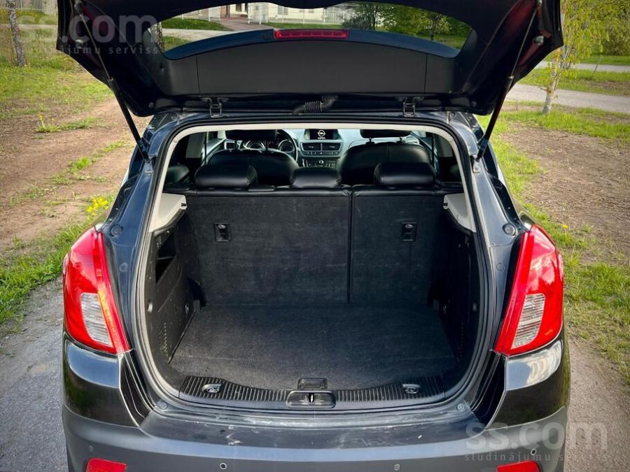 Black Opel Mokka 2013 in Riga, with an engine capacity of 1.70 L and mileage of 279 thousand km for 6500 €, photo 7 on AUTOMOTO.COM.LV