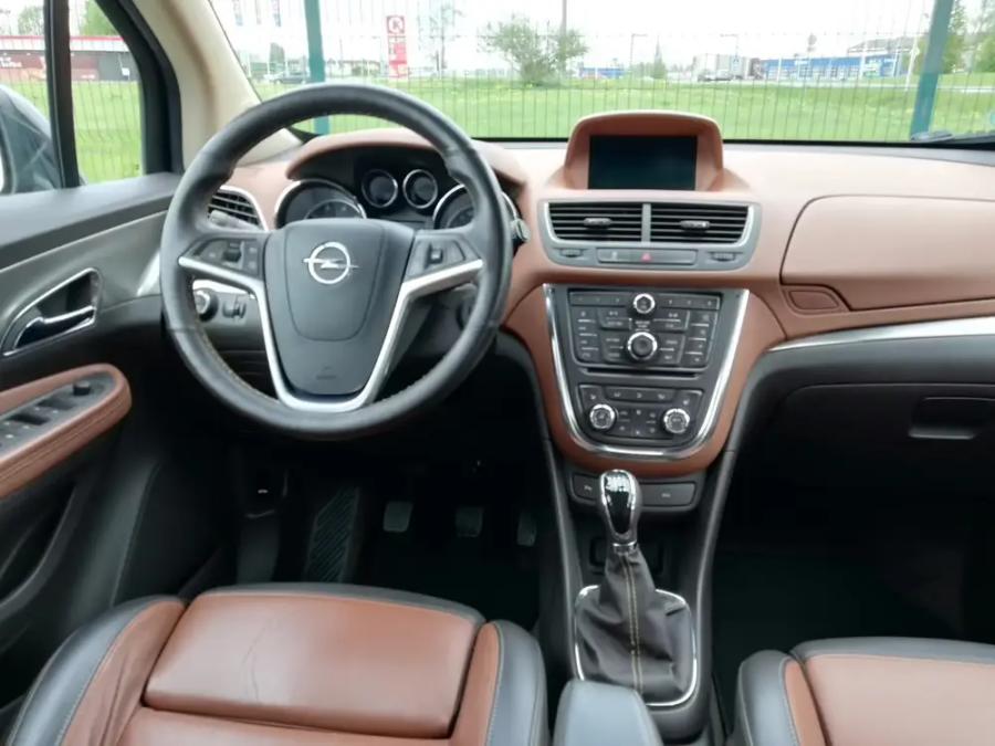 Black Opel Mokka 2013 in Saldus, with an engine capacity of 1.70 L and mileage of 165 thousand km for 8800 €, photo 10 on AUTOMOTO.COM.LV