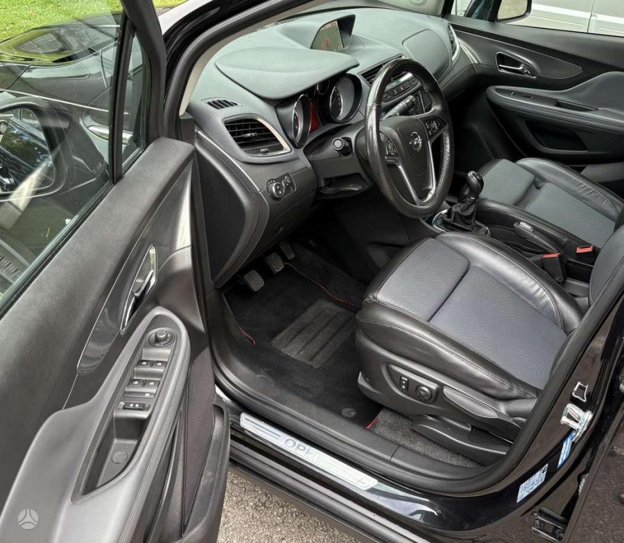 Black Opel Mokka 2013 in Druskininkai, with an engine capacity of 1.69 L and mileage of 179 thousand km for 7350 €, photo 18 on AUTOMOTO.COM.LV