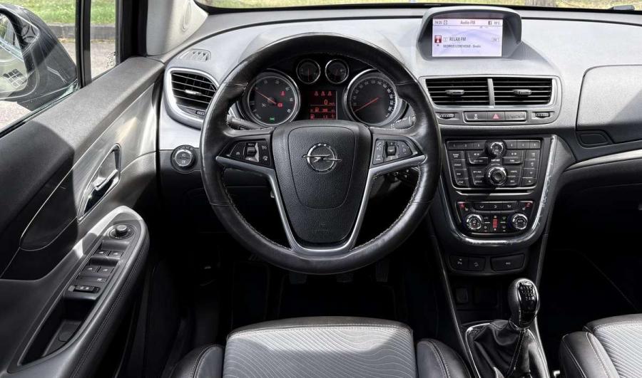 Black Opel Mokka 2013 in Druskininkai, with an engine capacity of 1.69 L and mileage of 179 thousand km for 7350 €, photo 23 on AUTOMOTO.COM.LV