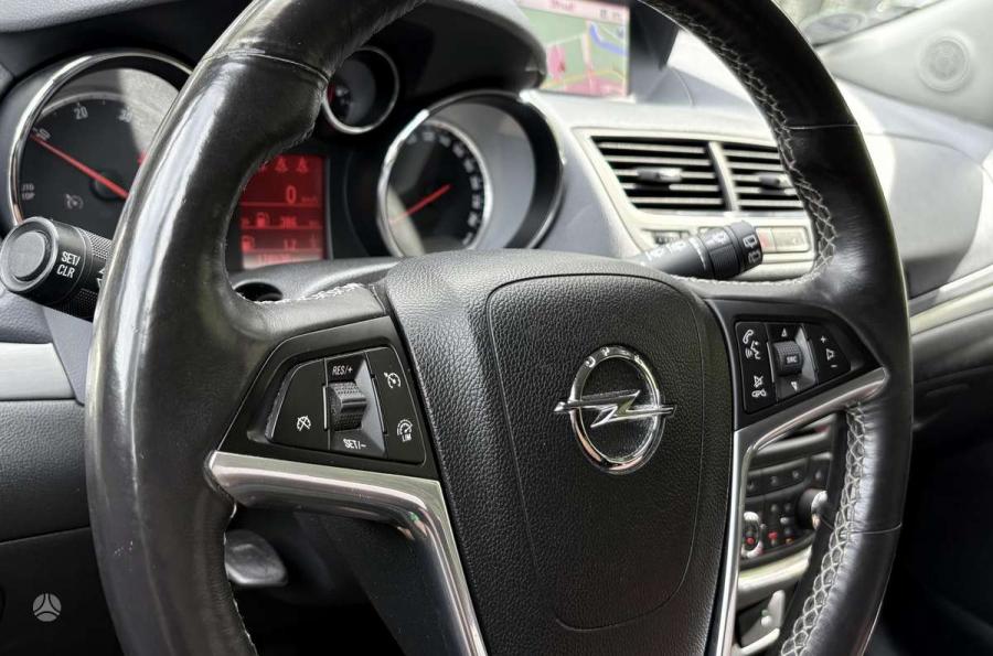 Black Opel Mokka 2013 in Druskininkai, with an engine capacity of 1.69 L and mileage of 179 thousand km for 7350 €, photo 29 on AUTOMOTO.COM.LV