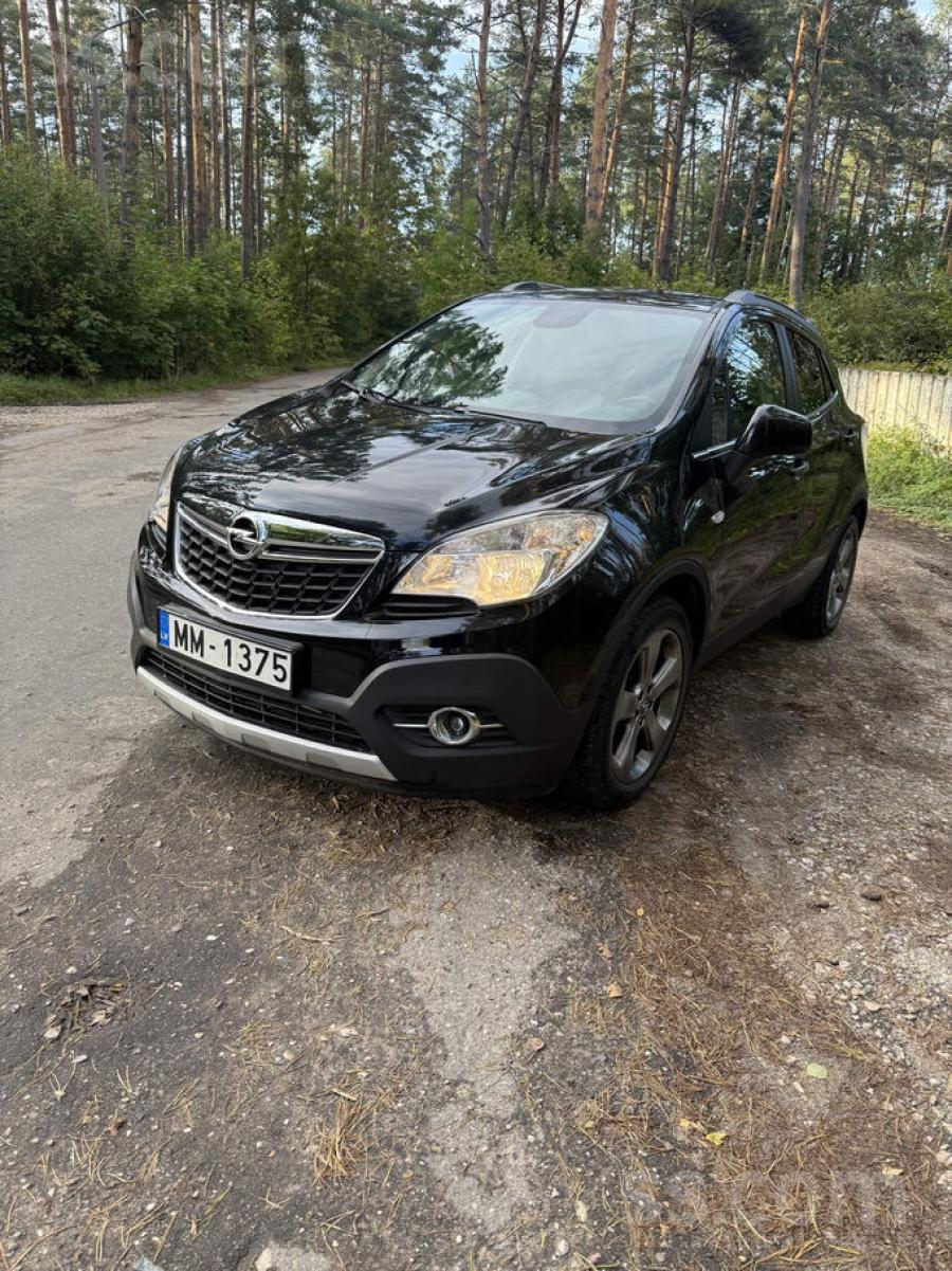 Black Opel Mokka 2013 in Riga, with an engine capacity of 1.70 L and mileage of 242 thousand km for 7100 €, photo 3 on AUTOMOTO.COM.LV