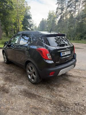 Black Opel Mokka 2013 in Riga, with an engine capacity of 1.70 L and mileage of 242 thousand km for 7100 €, photo 4 on AUTOMOTO.COM.LV