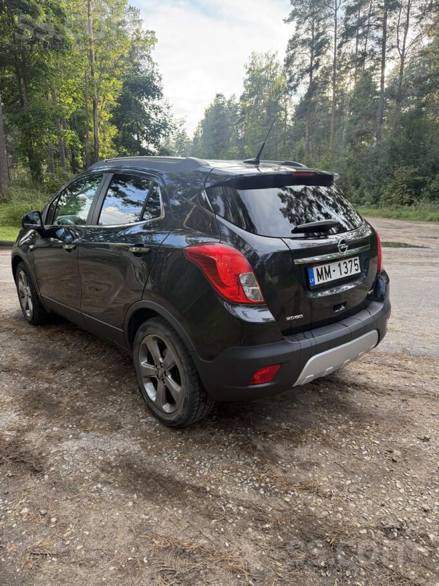 Black Opel Mokka 2013 in Riga, with an engine capacity of 1.70 L and mileage of 242 thousand km for 7100 €, photo 4 on AUTOMOTO.COM.LV