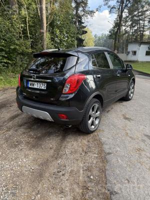 Black Opel Mokka 2013 in Riga, with an engine capacity of 1.70 L and mileage of 242 thousand km for 7100 €, photo 5 on AUTOMOTO.COM.LV