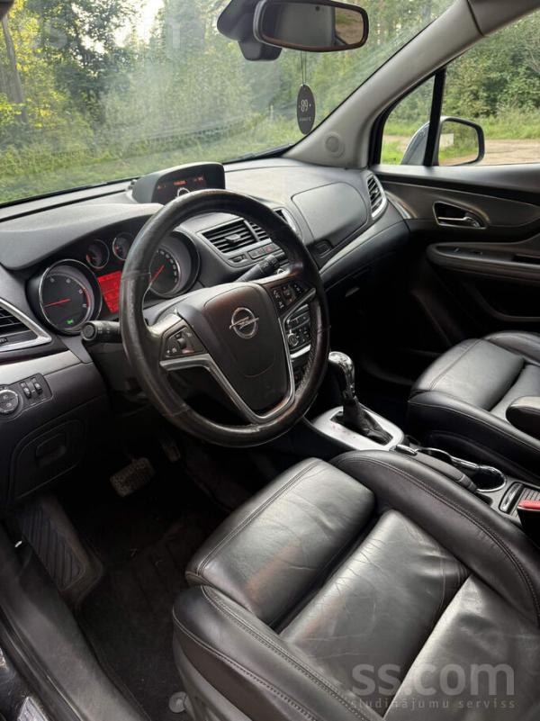 Black Opel Mokka 2013 in Riga, with an engine capacity of 1.70 L and mileage of 242 thousand km for 7100 €, photo 7 on AUTOMOTO.COM.LV