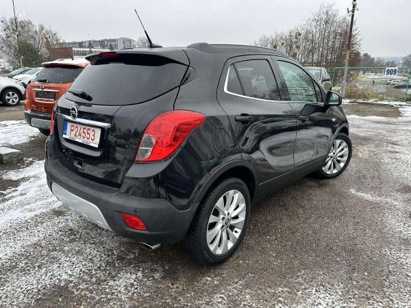 Black Opel Mokka 2014 in Alytus, with an engine capacity of 1.69 L and mileage of 185 thousand km for 8400 €, photo 3 on AUTOMOTO.COM.LV