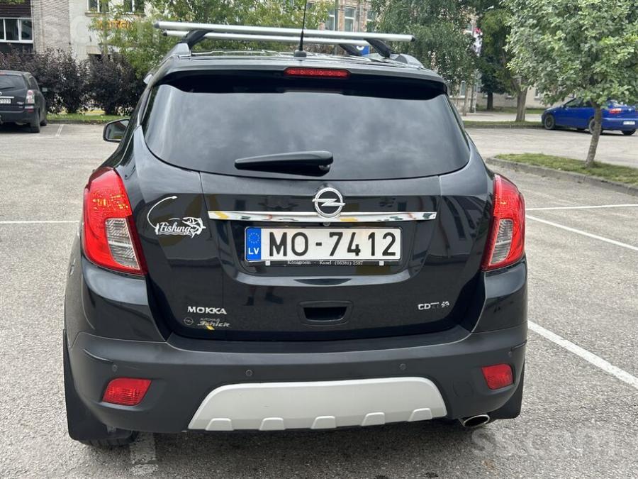 Black Opel Mokka 2014 in Daugavpils, with an engine capacity of 1.70 L and mileage of 249 thousand km for 5950 €, photo 11 on AUTOMOTO.COM.LV
