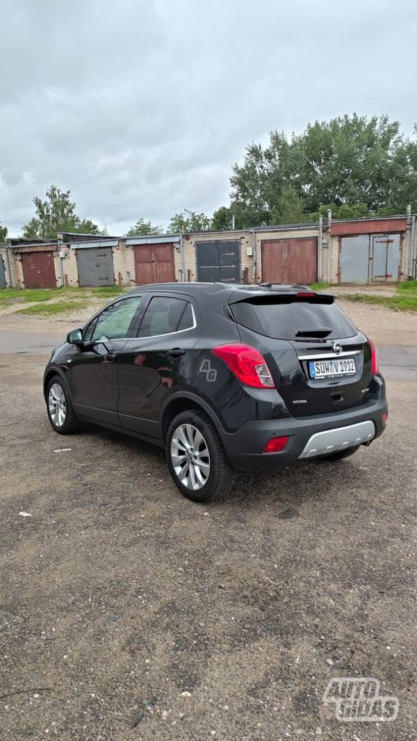 Black Opel Mokka 2015 in Utena, with an engine capacity of 1.60 L and mileage of 141 thousand km for 8200 €, photo 6 on AUTOMOTO.COM.LV