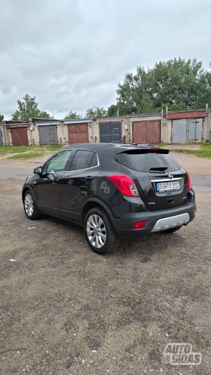 Black Opel Mokka 2015 in Utena, with an engine capacity of 1.60 L and mileage of 141 thousand km for 8200 €, photo 7 on AUTOMOTO.COM.LV
