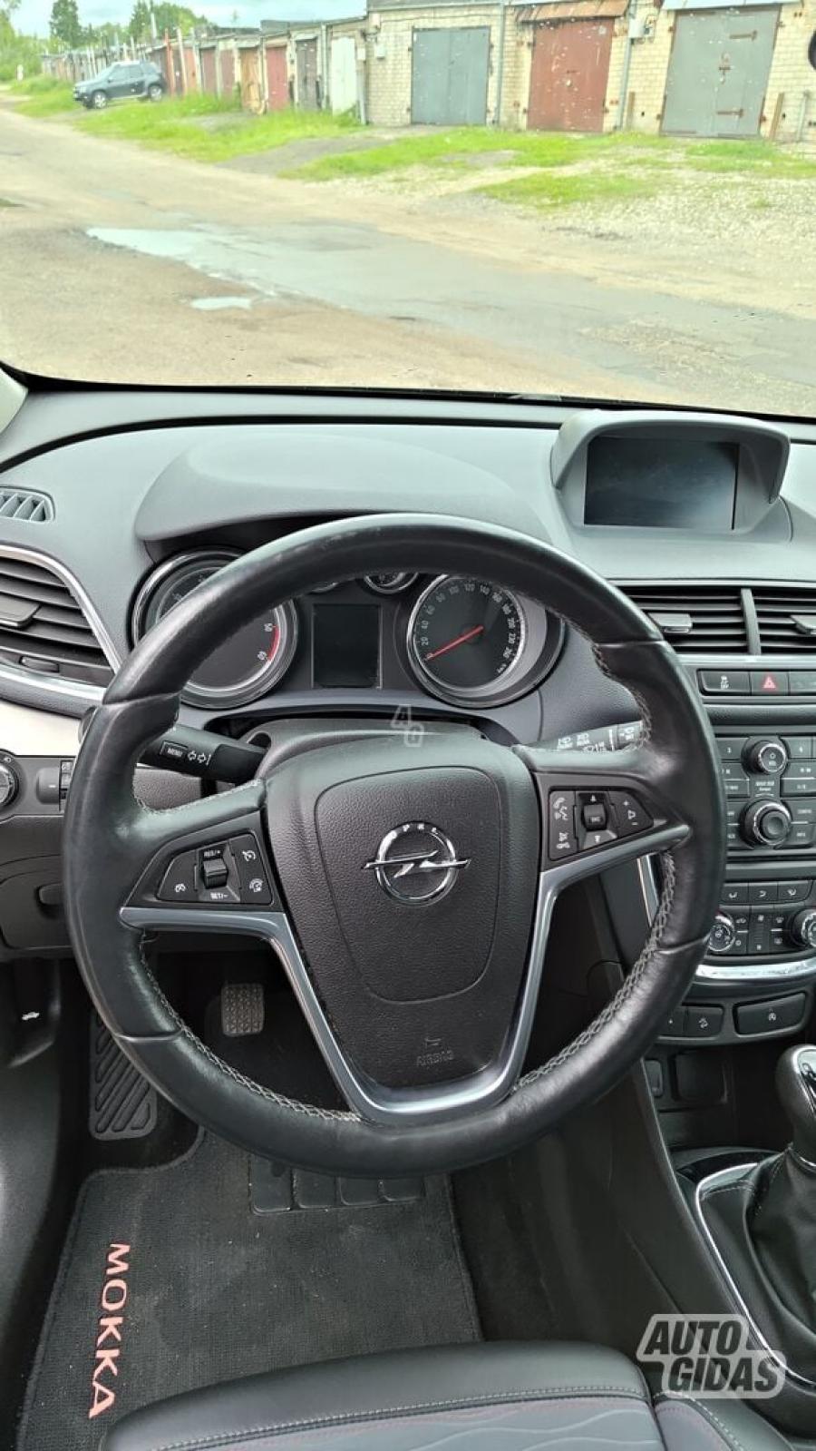 Black Opel Mokka 2015 in Utena, with an engine capacity of 1.60 L and mileage of 141 thousand km for 8200 €, photo 12 on AUTOMOTO.COM.LV