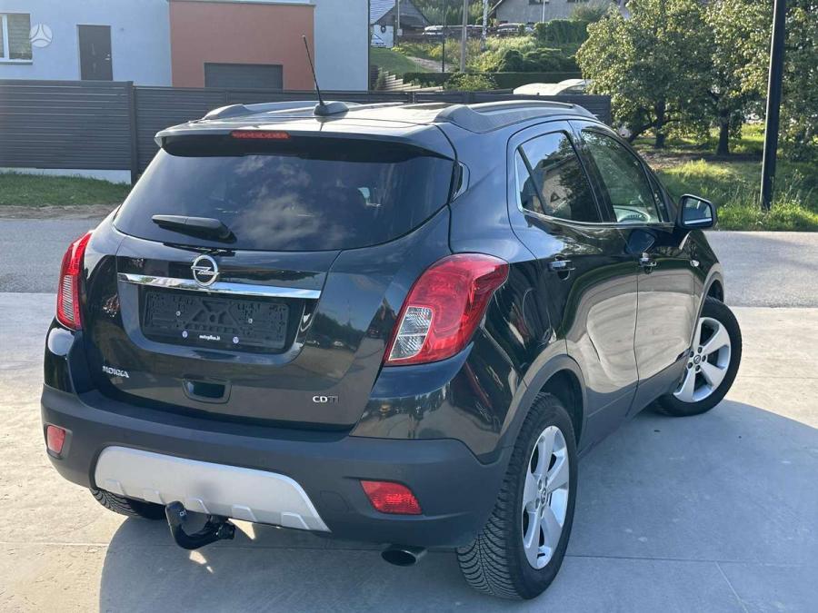 Black Opel Mokka 2015 in Alytus, with an engine capacity of 1.60 L and mileage of 167 thousand km for 7950 €, photo 6 on AUTOMOTO.COM.LV