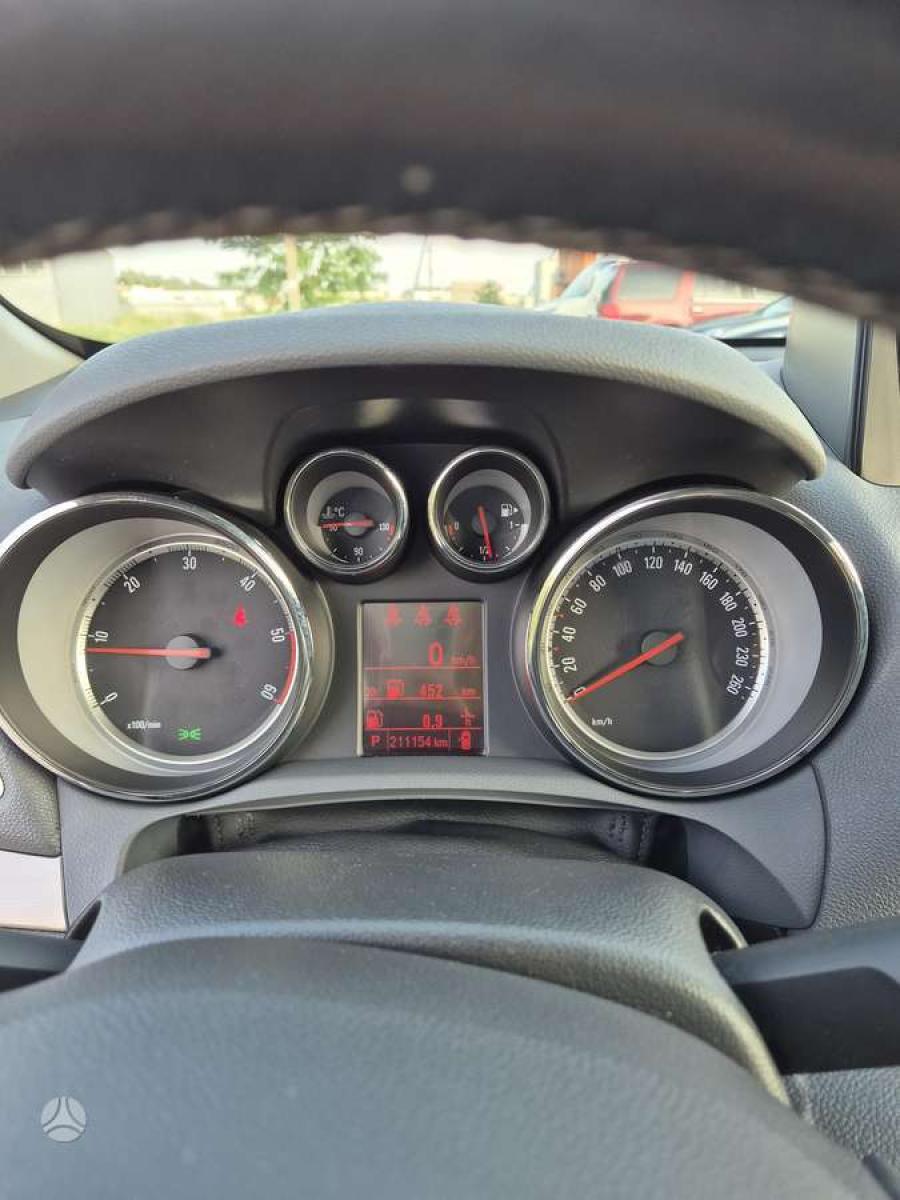 Black Opel Mokka 2016 in Kaunas, with an engine capacity of 1.60 L and mileage of 211 thousand km for 8000 €, photo 13 on AUTOMOTO.COM.LV