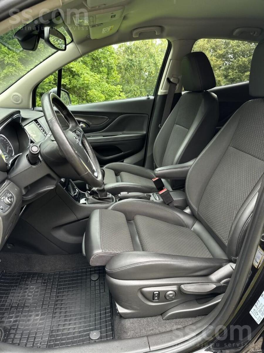 Black Opel Mokka 2017 in Talsi, with an engine capacity of 1.60 L and mileage of 192 thousand km for 10636 €, photo 13 on AUTOMOTO.COM.LV