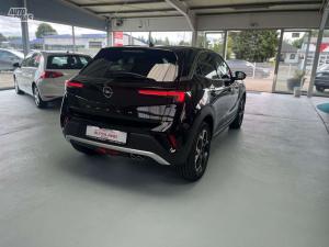 Black Opel Mokka 2021 in Kaunas, with an engine capacity of 1.20 L and mileage of 27 thousand km for 21834 €, photo 5 on AUTOMOTO.COM.LV