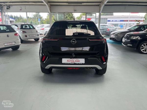 Black Opel Mokka 2021 in Kaunas, with an engine capacity of 1.20 L and mileage of 27 thousand km for 21834 €, photo 6 on AUTOMOTO.COM.LV