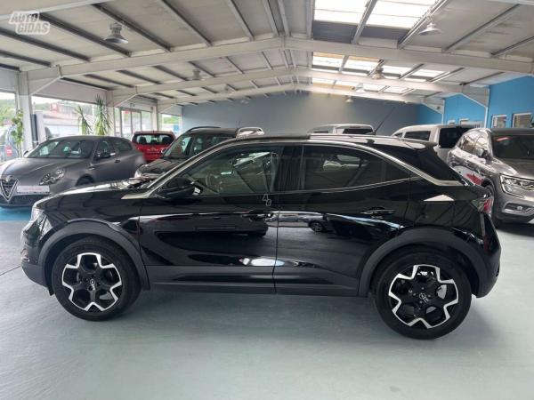 Black Opel Mokka 2021 in Kaunas, with an engine capacity of 1.20 L and mileage of 27 thousand km for 21834 €, photo 8 on AUTOMOTO.COM.LV
