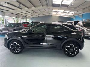 Black Opel Mokka 2021 in Kaunas, with an engine capacity of 1.20 L and mileage of 27 thousand km for 21834 €, photo 8 on AUTOMOTO.COM.LV