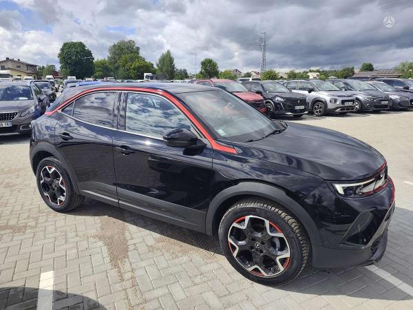 Black Opel Mokka 2021 in Taurage, with an engine capacity of 1.20 L and mileage of 103 thousand km for 13552 €, photo 2 on AUTOMOTO.COM.LV