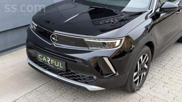 Black Opel Mokka 2021 in Riga, with an engine capacity of 1.60 L and mileage of 44 thousand km for 18900 €, photo 3 on AUTOMOTO.COM.LV