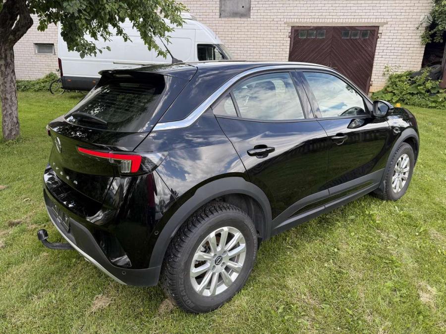 Black Opel Mokka 2021 in Panevezys, with an engine capacity of 1.20 L and mileage of 95 thousand km for 7600 €, photo 4 on AUTOMOTO.COM.LV