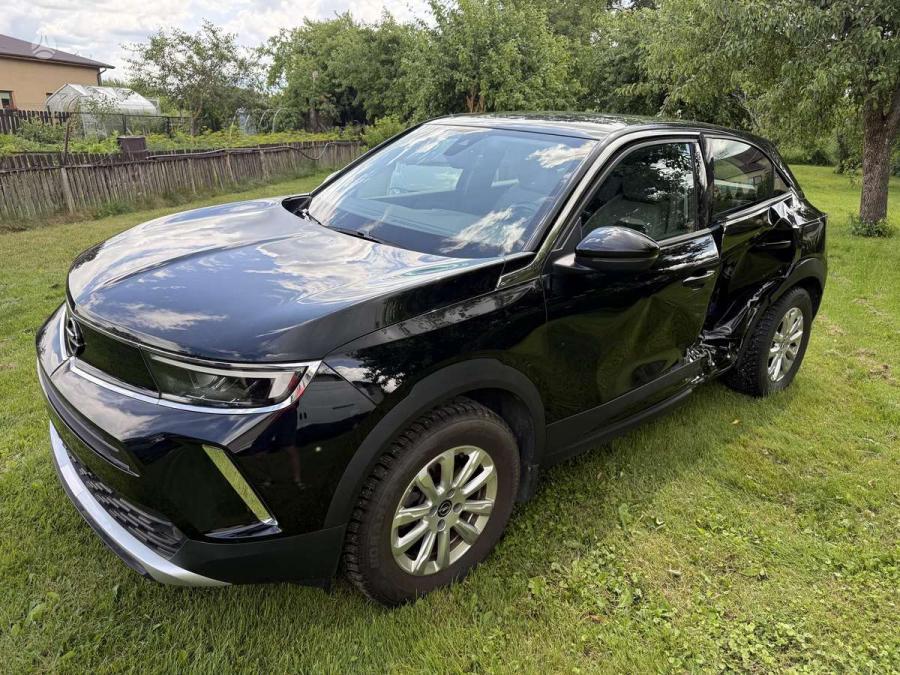 Black Opel Mokka 2021 in Panevezys, with an engine capacity of 1.20 L and mileage of 95 thousand km for 7600 €, photo 7 on AUTOMOTO.COM.LV