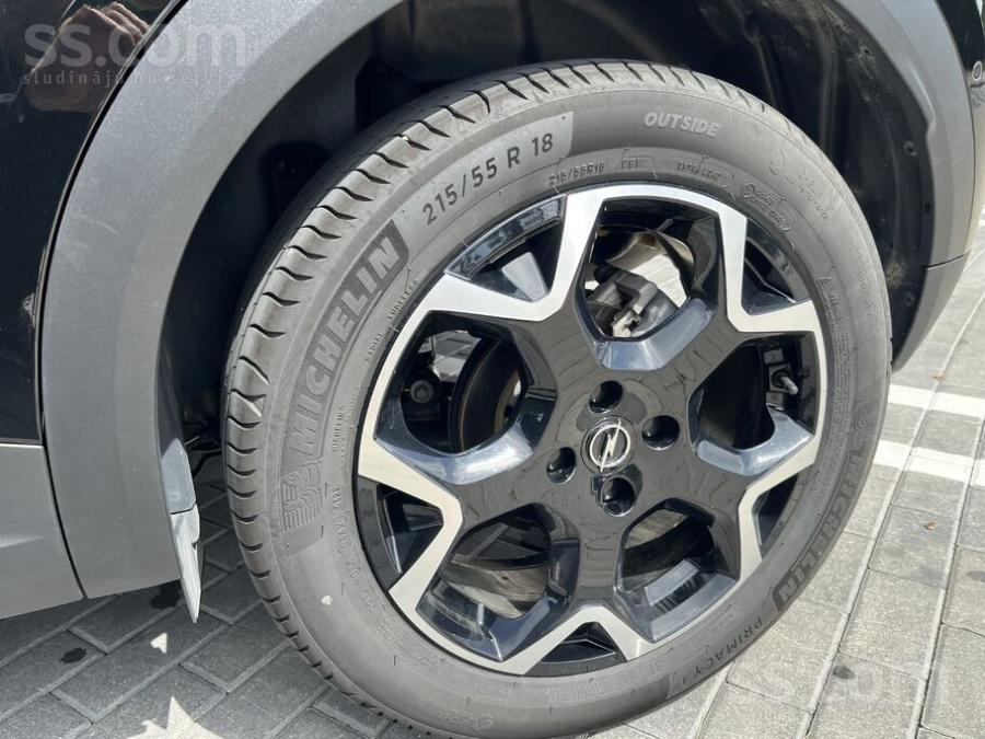 Black Opel Mokka 2022 in Ventspils, with an engine capacity of 1.20 L and mileage of 22 thousand km for 20100 €, photo 13 on AUTOMOTO.COM.LV