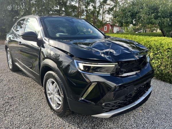 Black Opel Mokka 2022 in Kaunas, with an engine capacity of 0.00 L and mileage of 63 thousand km for 8450 €, photo 3 on AUTOMOTO.COM.LV